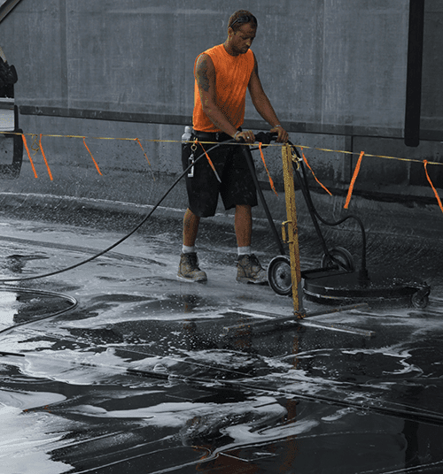 How Does an SRM Roofing Solution Restore a Rubber Roof?